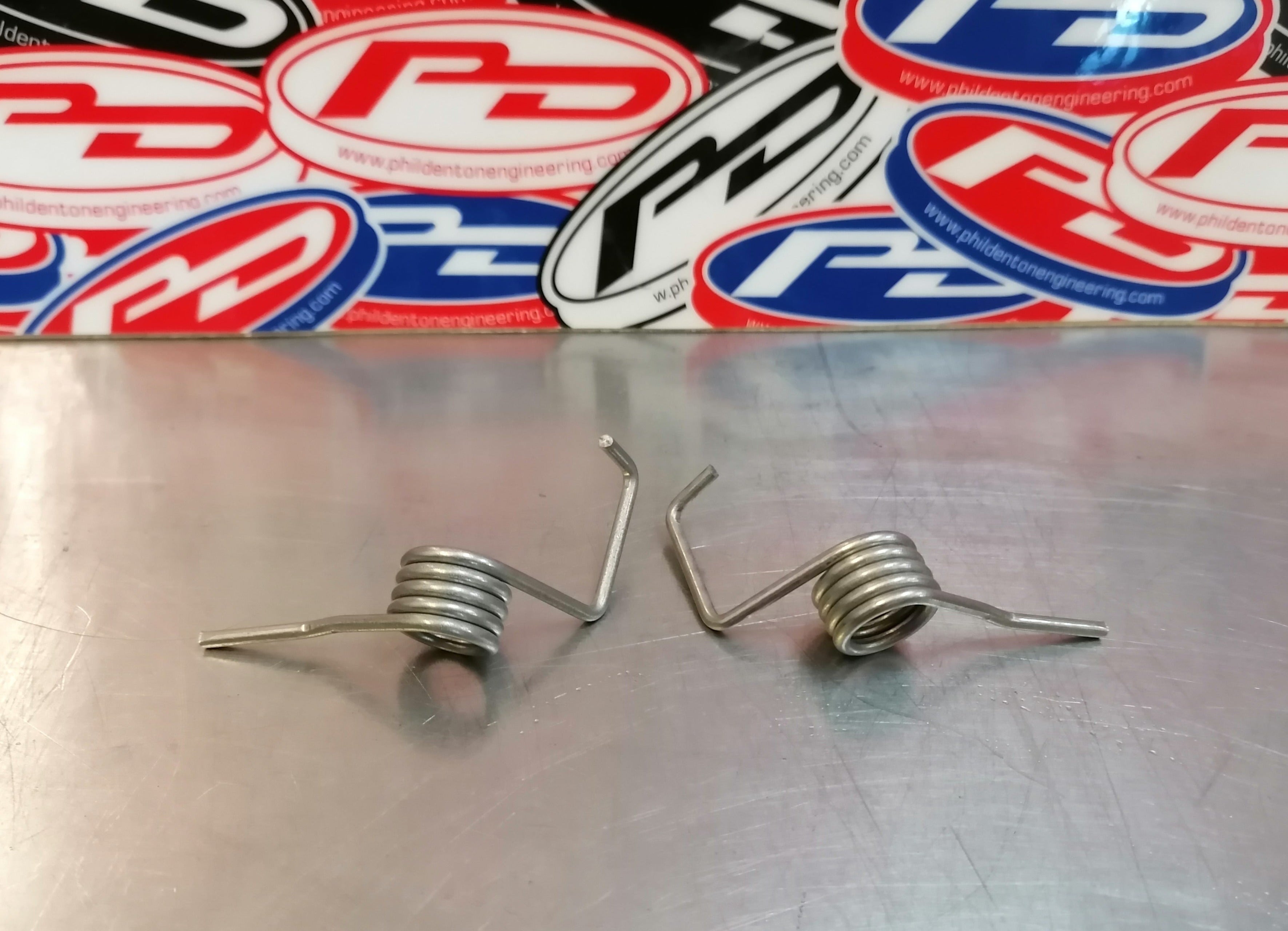 1986 CR Footrest Return Spring set. – SpD Factory Developments